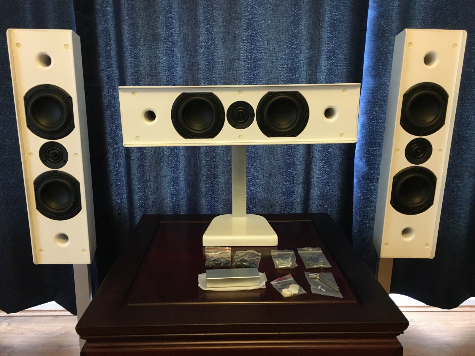 Krix Tryptix x 3 (left, right and center). Speakers include wall mounts ...