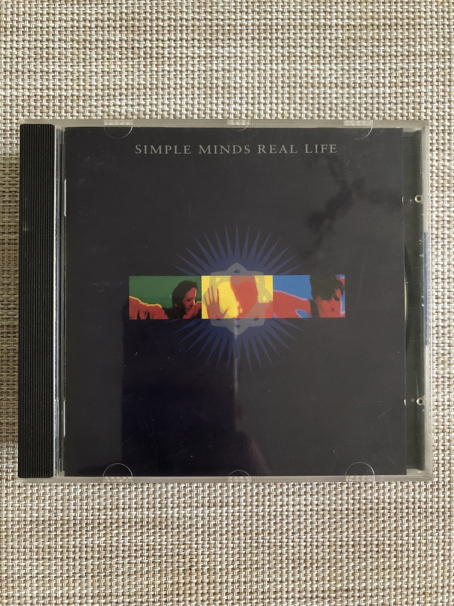 Simple Minds - Real Life CD - Vinyl, CD, and Blu-ray - StereoNET